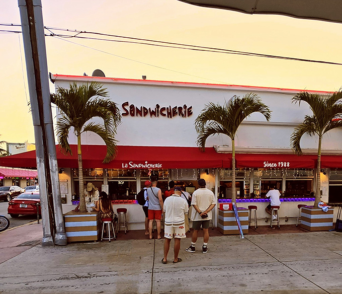 The unassuming storefront with its signature red awning proves that culinary greatness doesn't need flashy neon or velvet ropes&mdash;just perfect sandwiches and hungry customers.
