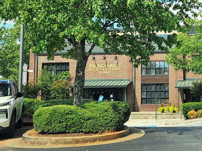 Paschal's brick exterior welcomes you with understated elegance, promising Southern comfort behind those doors without any unnecessary fuss.