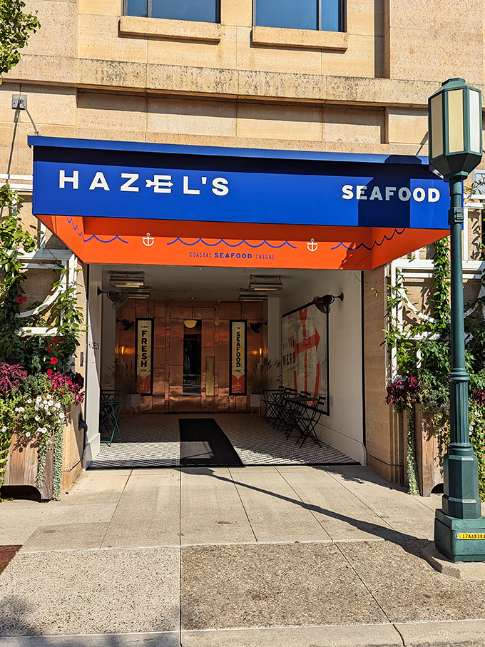 The blue awning of Hazel's stands out like a maritime beacon on Birmingham's streets, promising seafood treasures for landlocked Michiganders.