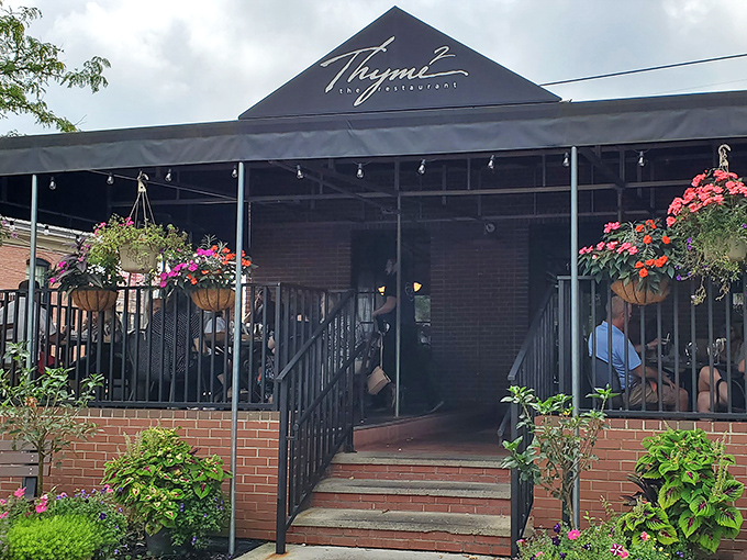 Thyme2's inviting exterior welcomes you with colorful hanging flower baskets and a covered patio&mdash;like a culinary hug before you even step inside.