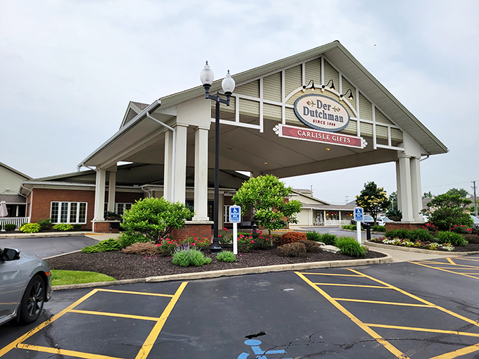 The welcoming portico of Der Dutchman stands like a beacon of comfort food, promising culinary salvation to hungry travelers and locals alike.