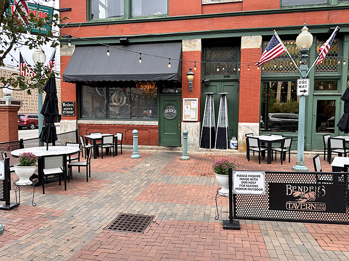 Brick, flags, and history &ndash; Bender's Tavern's exterior promises an all-American dining experience that's been perfected over generations in downtown Canton.