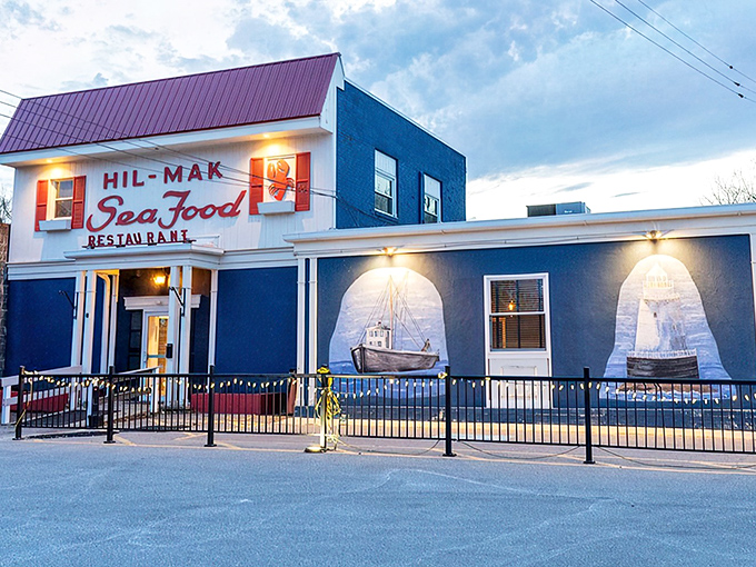 The blue and red exterior of Hil-Mak beckons like a nautical mirage in Ohio, complete with charming fishing boat mural that whispers, "Yes, we know our seafood."