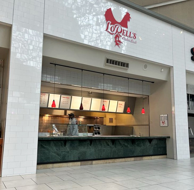 The iconic red chicken logo of LoRell's beckons from its clean, minimalist storefront&mdash;proof that greatness doesn't need flashy advertising.