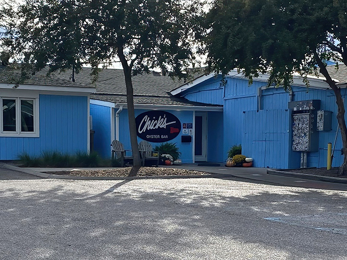 The iconic blue exterior with its simple oval sign promises no pretension&mdash;just seriously good seafood waiting inside. Virginia Beach's worst-kept secret beckons.
