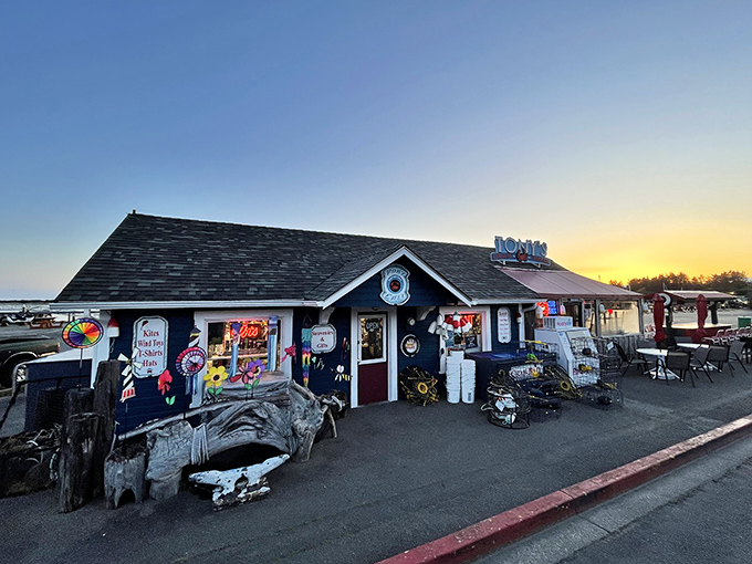 Sunset magic at Tony's Crab Shack, where the weathered blue exterior and quirky nautical decor hint at the seafood treasures waiting inside.