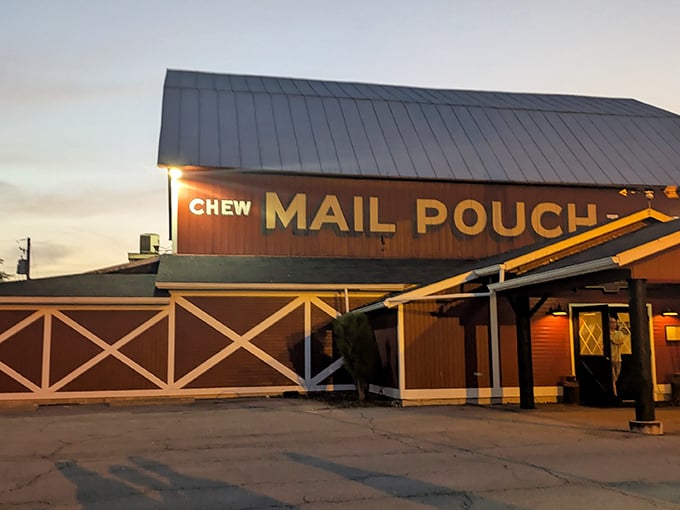 The iconic red barn exterior with its Mail Pouch Tobacco sign and spinning windmill isn't just Instagram-worthy&mdash;it's a promise of authentic Midwestern flavor waiting inside.