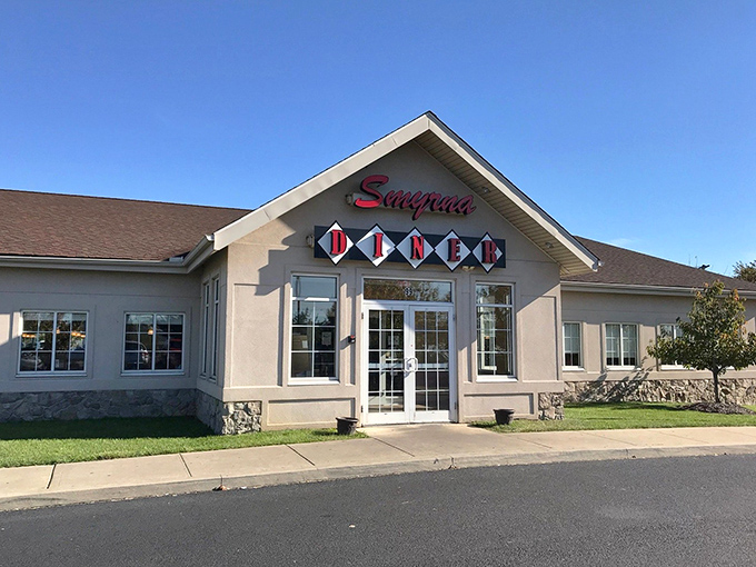 The classic facade of Smyrna Diner stands like a beacon of breakfast hope along Route 13, promising comfort food that hugs your soul.