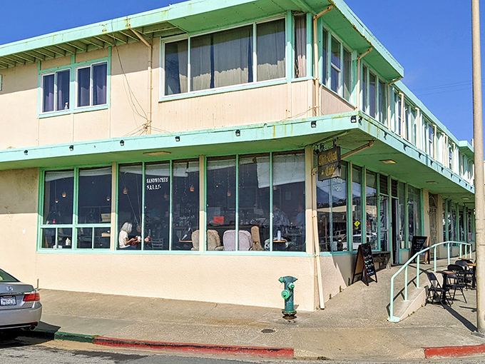 The unassuming mint-green exterior of Chit Chat Cafe stands like a modest guardian of culinary treasures, promising ocean views and sandwich perfection just steps from Pacifica's shoreline.