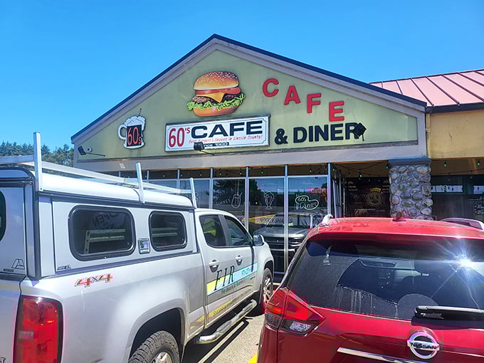 The burger on the sign is practically winking at hungry travelers. This Lincoln City landmark promises a time-traveling culinary adventure right off Highway 101.