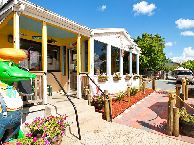 Welcome to paradise! The cheerful yellow exterior with its friendly alligator greeter promises a tropical escape in the heart of Frederick.