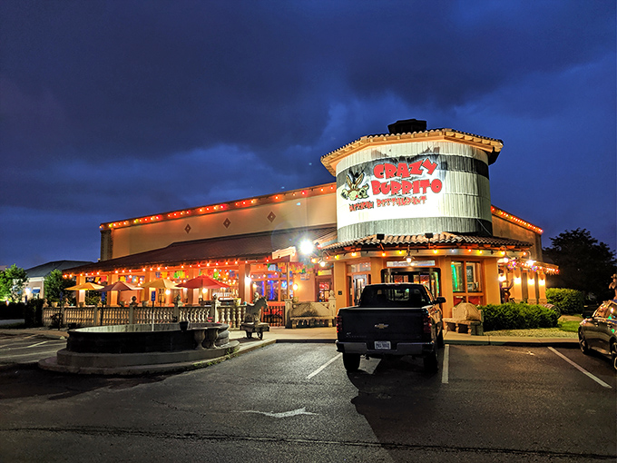 The distinctive cylindrical entrance of Crazy Burrito stands like a terra-cotta beacon in Hilliard, promising Mexican delights that'll make your taste buds do the happy dance.