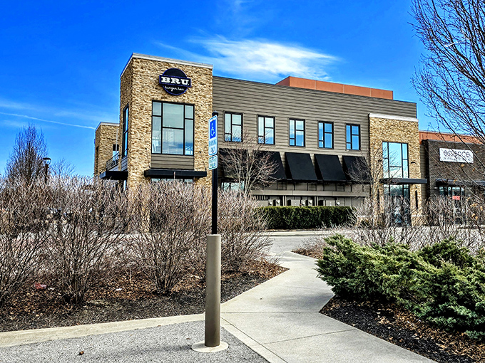 Bru Burger Bar's striking stone-and-glass facade makes a bold architectural statement in Westerville, like a delicious fortress dedicated to the noble burger arts.