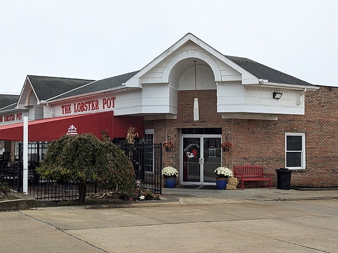 The unassuming brick exterior of The Lobster Pot belies the seafood treasures within. That red awning is like a beacon for hungry Ohioans.