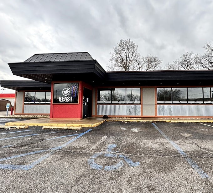 The unassuming exterior hides barbecue greatness like Clark Kent's glasses hide Superman. Red accents hint at the flavor explosions waiting inside.