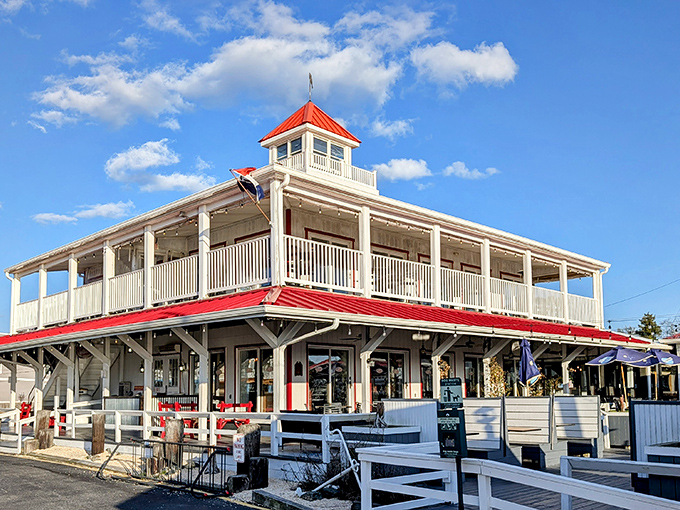 That iconic red roof against the Delaware sky isn't just eye-catching&mdash;it's a beacon for seafood lovers signaling the promise of ocean-fresh delights ahead.