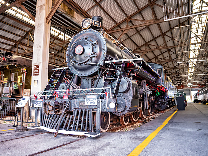 The Atlantic Coast Line 1504 steam locomotive stands like a sleeping giant, ready to transport visitors back to an era when these iron horses ruled America's rails.