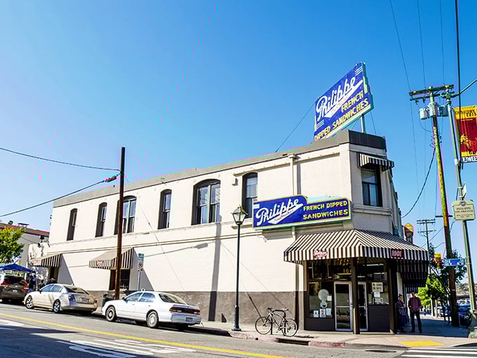 The iconic corner building of Philippe's stands proudly against the LA sky, a beacon of sandwich perfection since the early 20th century.
