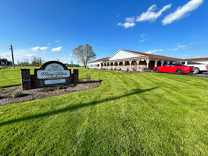 A slice of Americana awaits behind that welcoming white porch. The building practically whispers "come in and loosen your belt" against that perfect Ohio sky.
