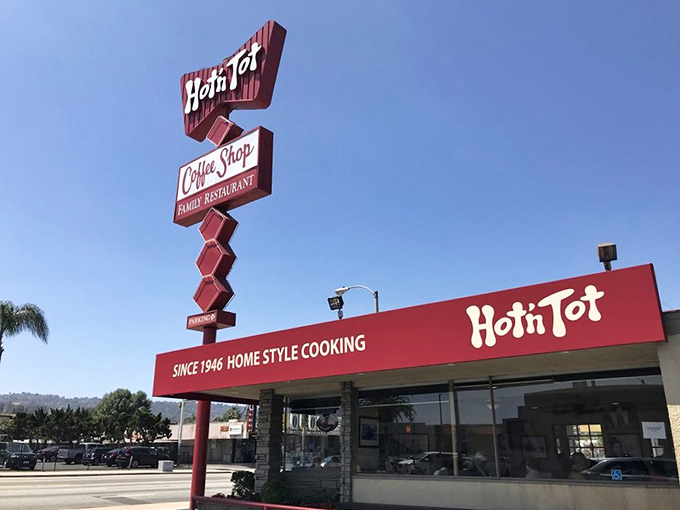 That iconic red arrow sign isn't just pointing to breakfast&mdash;it's directing you toward a time machine disguised as a diner. Pure roadside Americana at its finest.