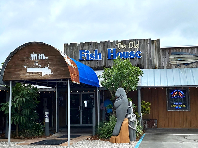 That weathered wooden charm whispers "authentic seafood paradise" before you even step inside this coastal treasure.