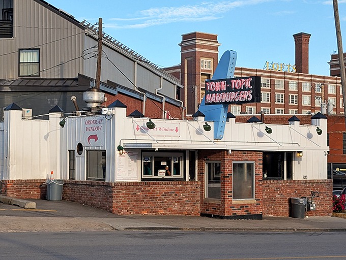 The blue arrow sign beckons like a neon North Star, guiding hungry pilgrims to this temple of timeless American comfort food.