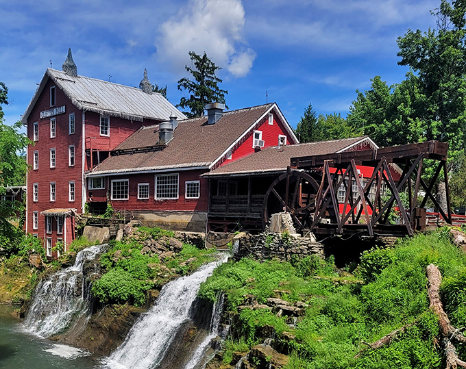 The iconic red mill perched above cascading waterfalls isn't just Instagram bait&mdash;it's a 200-year-old testament to when breakfast came with a side of history.