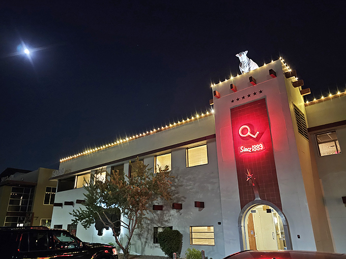 The iconic exterior of The Stockyards stands as a monument to Arizona's cattle heritage, complete with that unmistakable bull silhouette watching over hungry visitors.