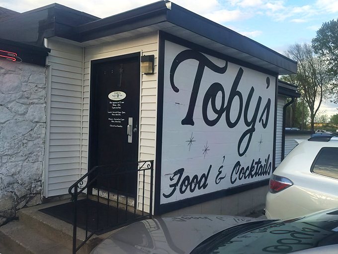 The unassuming exterior of Toby's Supper Club hides culinary treasures within, like finding a diamond in Wisconsin's supper club crown.