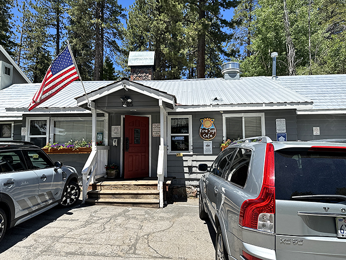 The unassuming exterior of Fire Sign Caf&eacute; &ndash; where breakfast dreams come true beneath towering Tahoe pines.