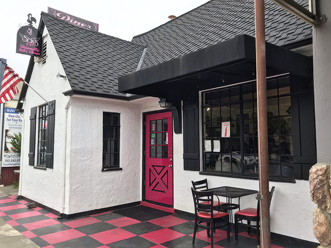 The pink door at Sax's Joint isn't just an entrance&mdash;it's a portal to comfort food nirvana. The checkerboard patio practically screams "good times ahead!"