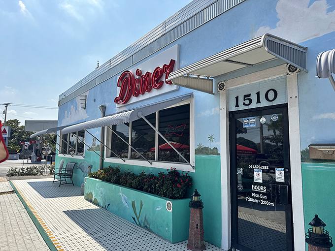 The turquoise beacon of breakfast bliss! Lighthouse Diner's vibrant exterior promises coastal charm and comfort food that's worth the morning pilgrimage.