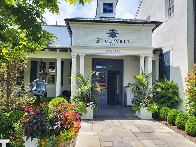 The historic Blue Bell Inn welcomes visitors with colonial charm and vibrant landscaping. A Pennsylvania landmark that whispers "come in and stay awhile."