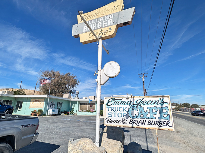 That vintage neon sign isn't just advertising - it's a beacon calling hungry souls home to Route 66 magic. 