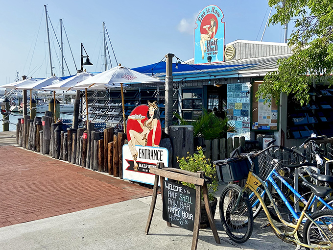 The iconic blue sign beckons seafood lovers like a siren call, while bicycles out front hint at the laid-back Key West lifestyle awaiting inside.
