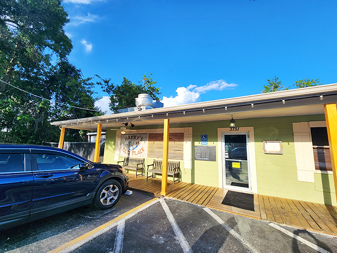 The unassuming yellow exterior of Harry's Old Place proves once again that in Florida, the most magical seafood experiences often hide in plain sight.