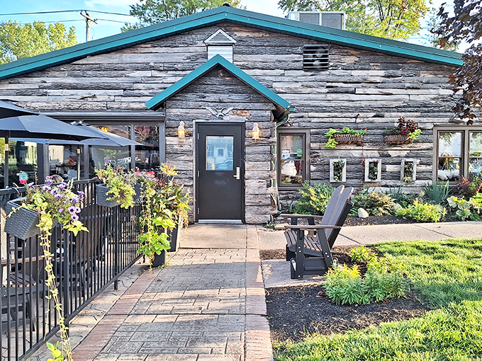 The rustic log exterior of Whitehouse Inn welcomes you like an old friend, complete with a charming patio that practically begs you to linger.