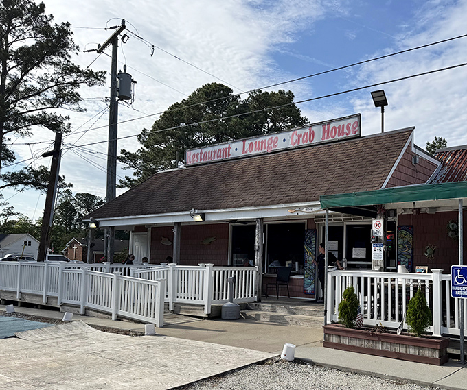 The unassuming entrance to seafood paradise. That weathered sign has guided hungry pilgrims to blue crab nirvana for decades.