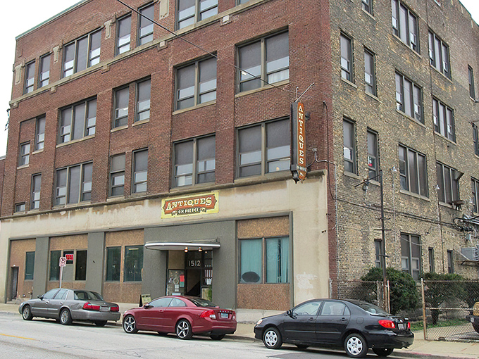 The unassuming brick exterior of Antiques on Pierce hides a wonderland of treasures inside, like a history-filled Narnia behind an industrial wardrobe.