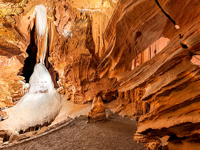 Nature's most patient sculptor has crafted these golden limestone formations over millions of years, creating an underground masterpiece that puts human art to shame.
