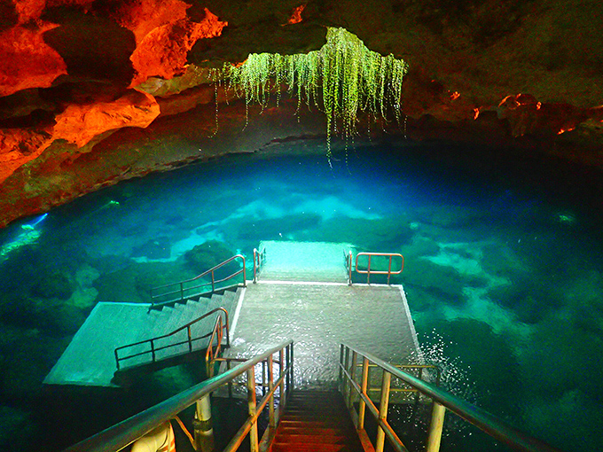 The entrance to another world awaits at the bottom of these stairs. Mother Nature's own light show illuminates this underground oasis.