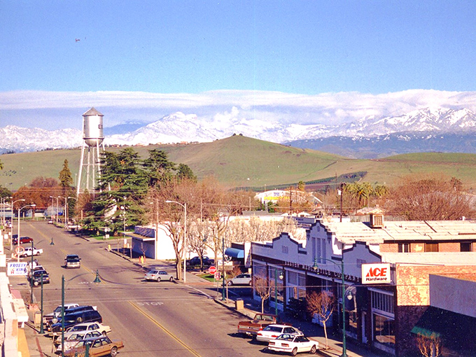 That iconic water tower stands like a friendly giant, welcoming visitors to Exeter's charming embrace.