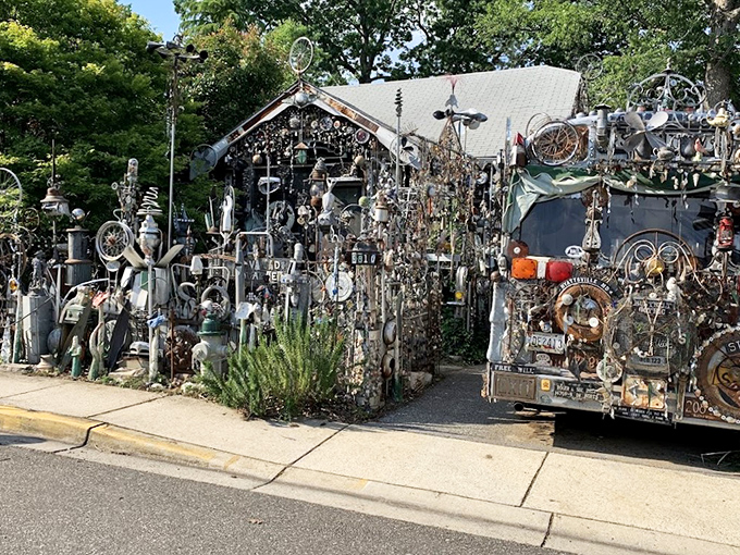 The front facade of Vanadu Art House looks like what would happen if a hardware store and a carnival had a baby that went to art school.