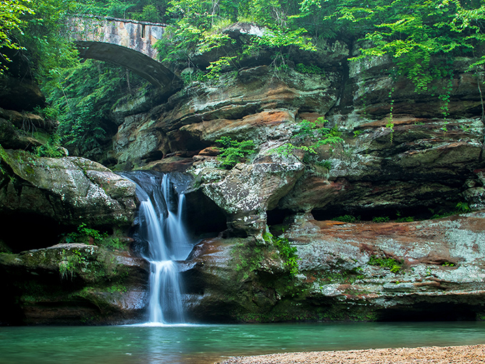 Nature's perfect waterfall doesn't exi&mdash; Oh wait, it does! Upper Falls at Old Man's Cave creates a postcard moment that no filter could improve.