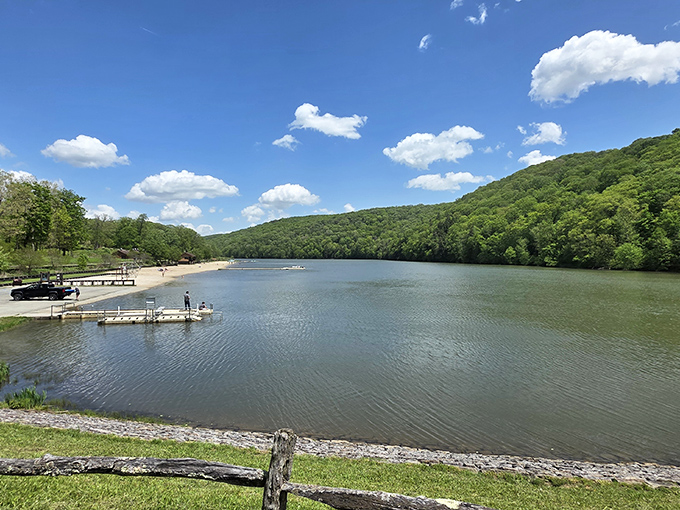 Mirror, mirror on the lake – autumn's fiery palette doubles its splendor on Laurel Hill Lake's glass-like surface. Nature showing off at its finest!
