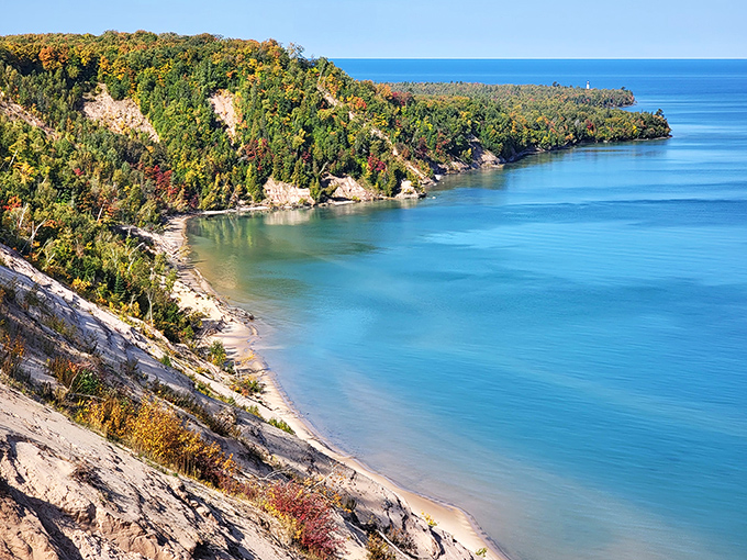 Nature's own stone archway, Lovers Leap stands as a testament to Lake Superior's patient artistry, framing the turquoise waters beyond like a living postcard.