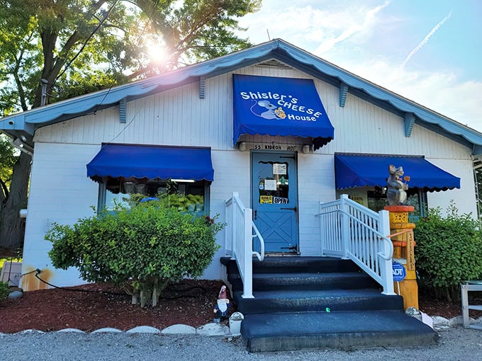 The little white building with bright blue awnings isn't trying to impress anyone&mdash;until you taste what's inside. Ohio's cheese paradise hiding in plain sight.
