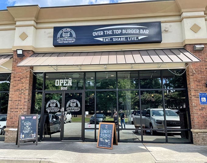 The unassuming storefront of Over The Top Burger Bar beckons like a siren song to burger enthusiasts. Behind those doors, culinary magic awaits the brave and hungry.