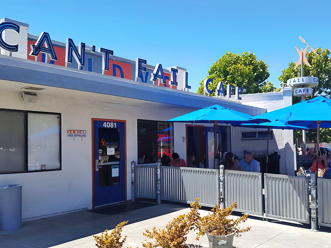 The blue awnings and colorful signage of Rudy's Can't Fail Cafe stand like a retro oasis in Emeryville, promising good food and zero pretension.