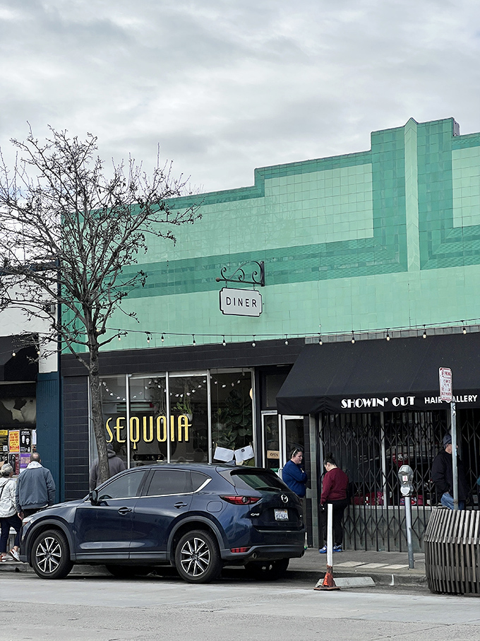 That distinctive mint-green facade might fool you into thinking it's just another storefront, but breakfast magic awaits inside.